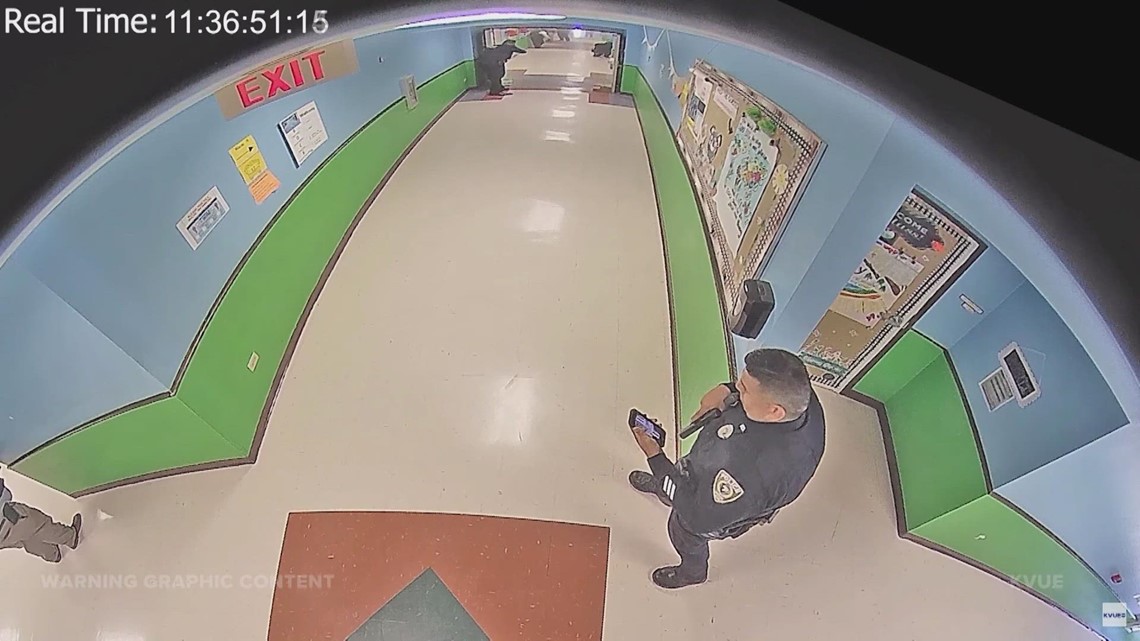Officer seen on phone in Robb Elementary hallway was trying to contact ...
