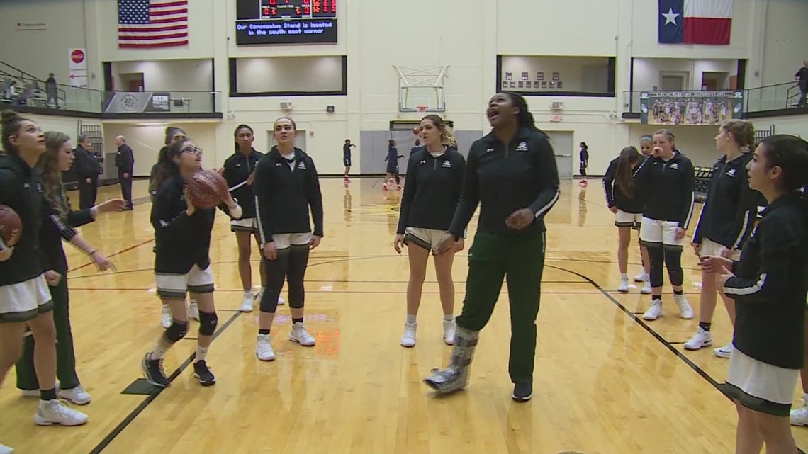 Reagan HS senior who has autism suits up for varsity basketball game ...