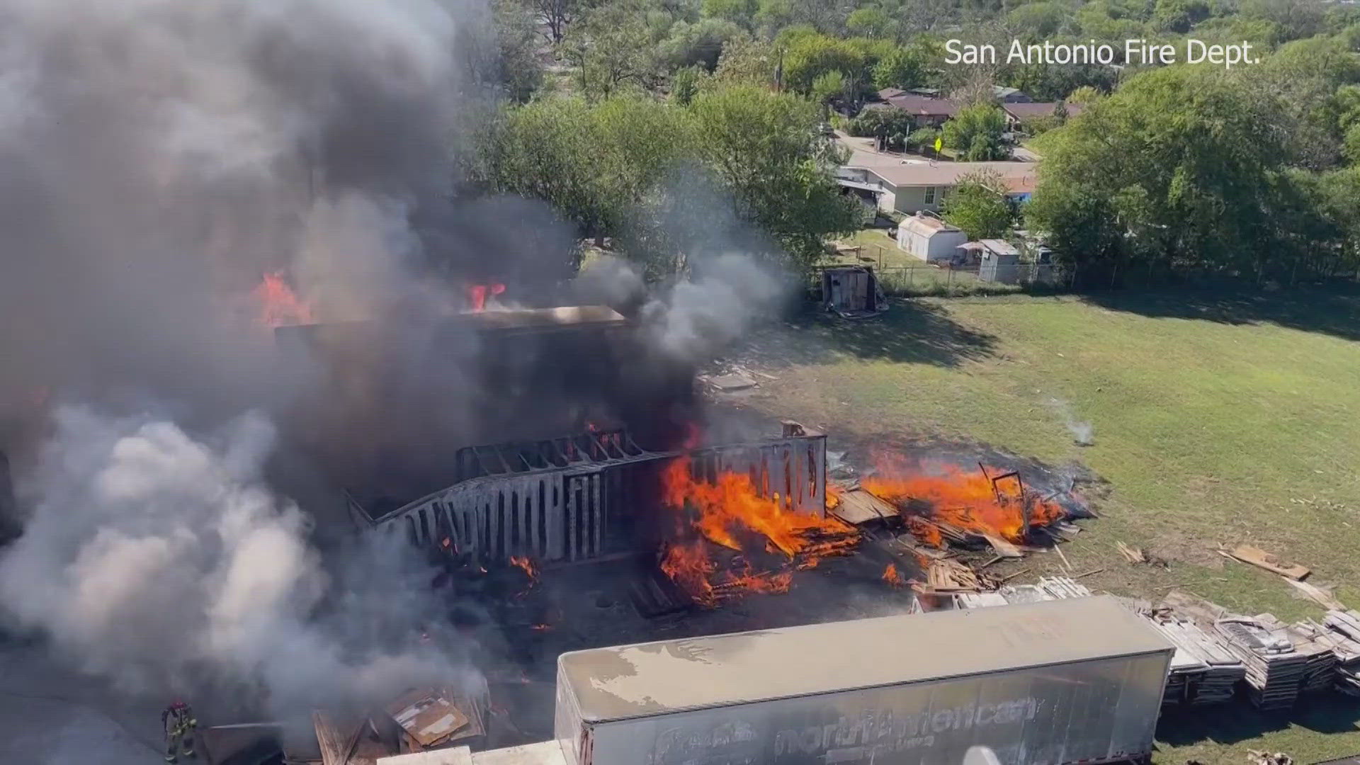 Major fire reported involving multiple 18-wheelers on northeast side of ...