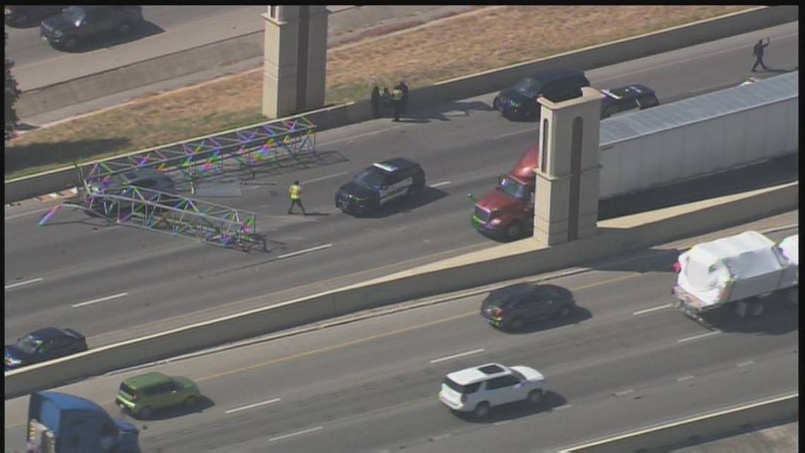 Sign falls onto I-35, causing major traffic accident | kens5.com