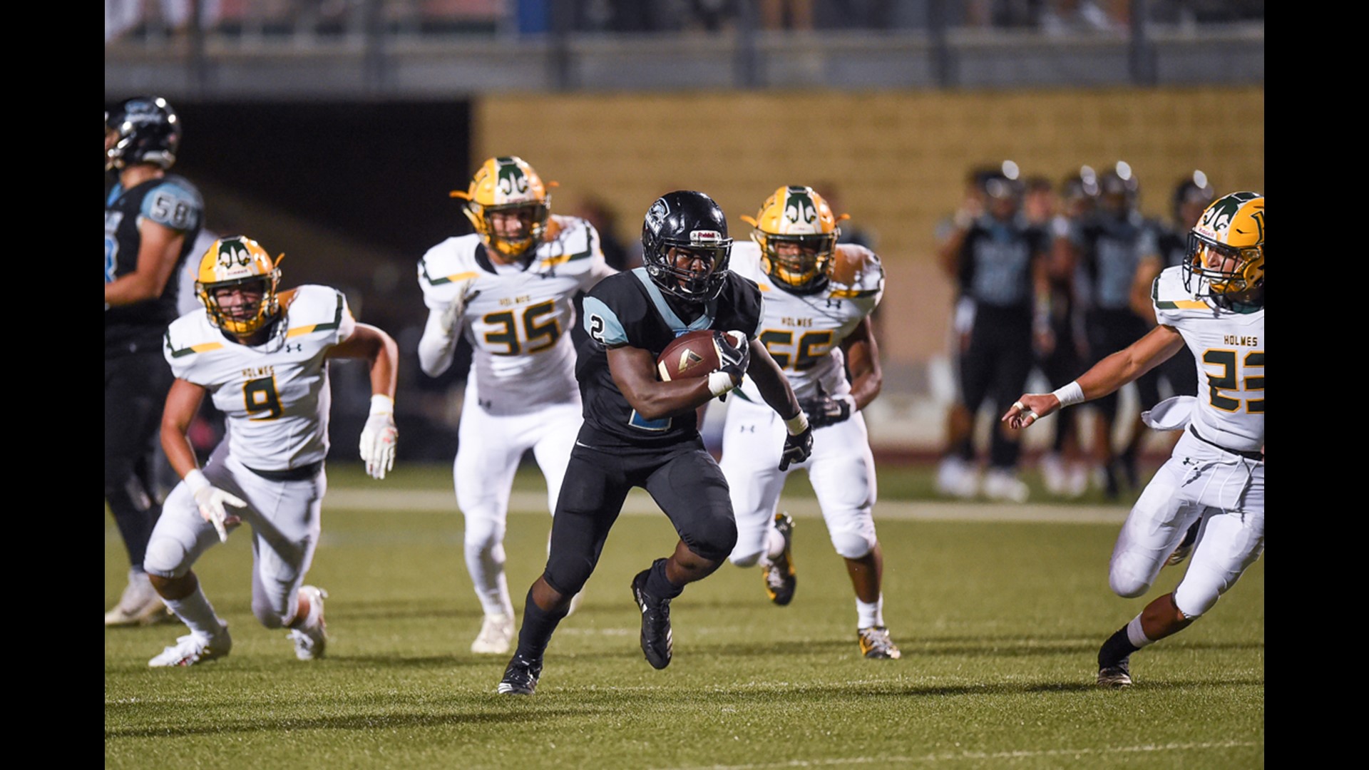 PHOTOS: Harlan gets milestone victory over Holmes in first ever game ...