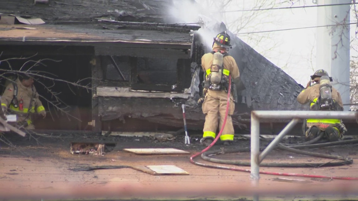 SA firefighters sift through damaged structures after fire on the east ...