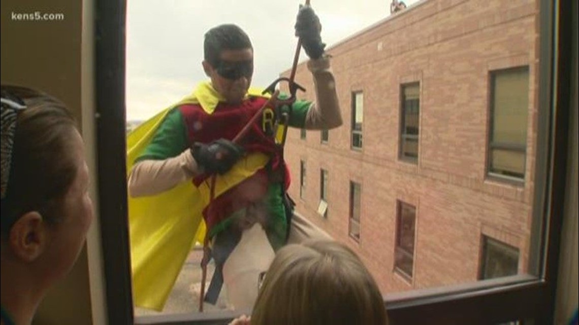 SAPD, SWAT suit up to bring Halloween to hospital patients | kens5.com