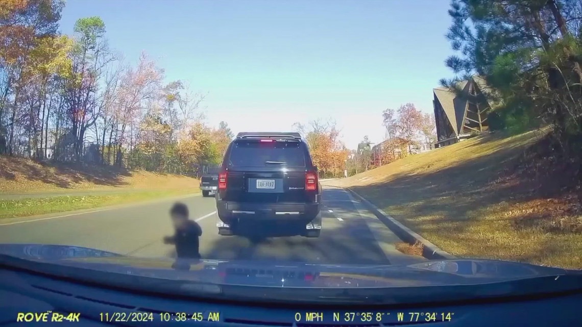 Caught on camera: Toddler running alongside busy road, man jumps out of ...