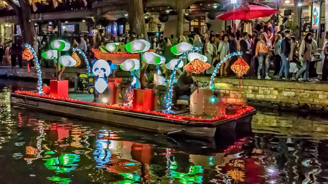 'Magically illuminated floats...along the downtown portion of the River ...