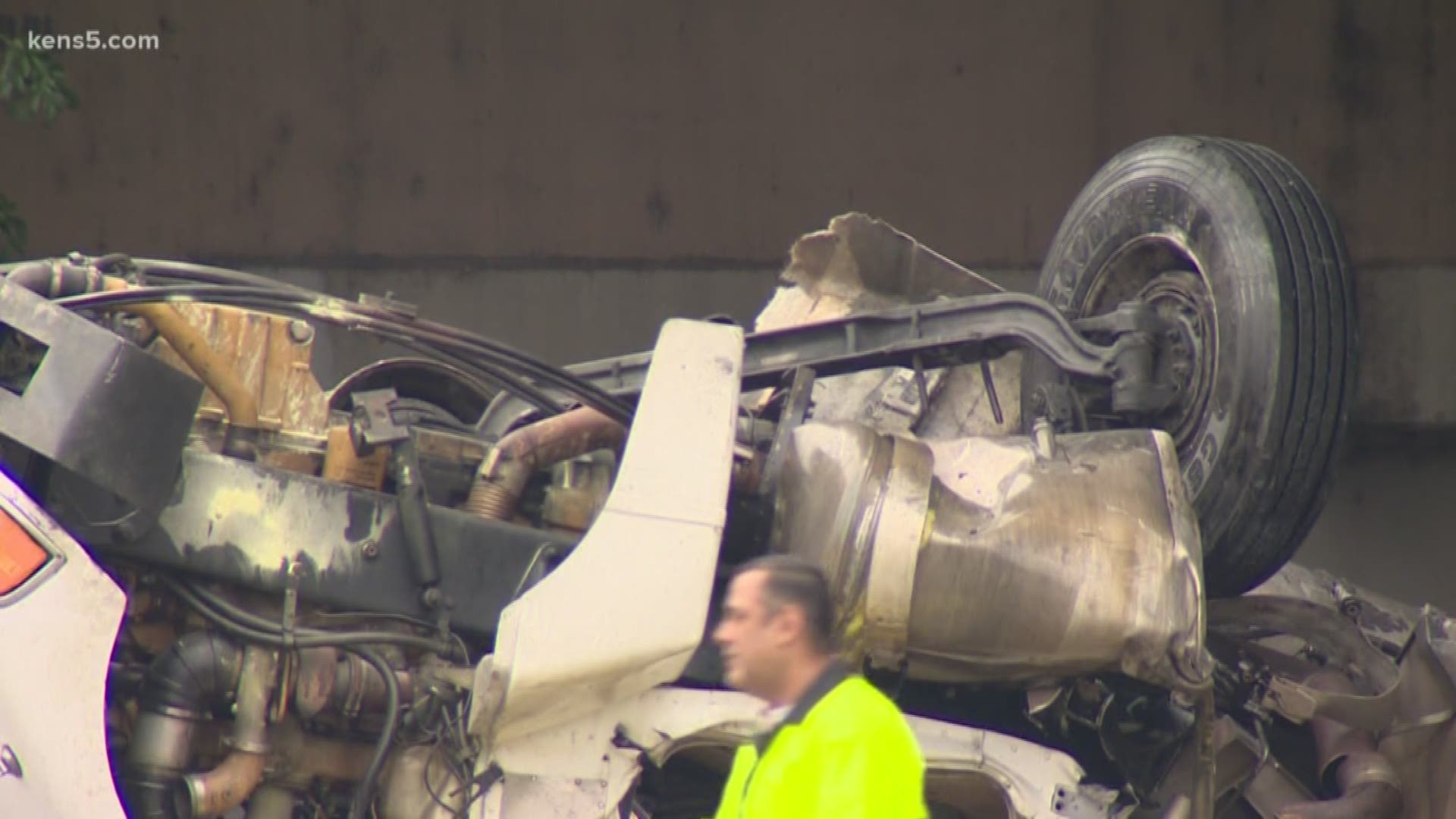 UPDATE: Driver killed after big rig plunges off highway near downtown ...