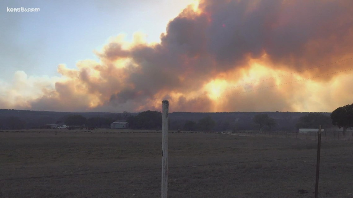 Evacuated residents hoping to go home as large wildfires burn across ...