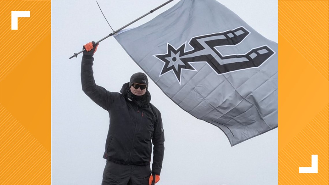 Mission accomplished! Spurs fan plants Spurs flag atop Mt Fuji | kens5.com