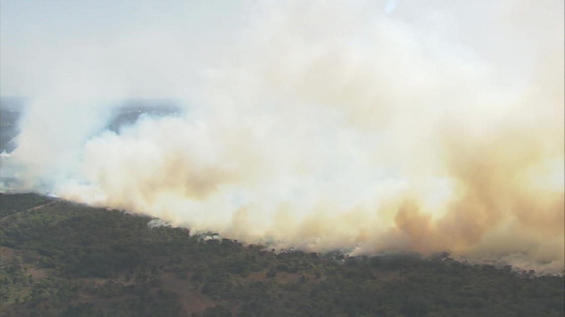 Multiple fire crews battle a brush fire at Camp Bullis | kens5.com