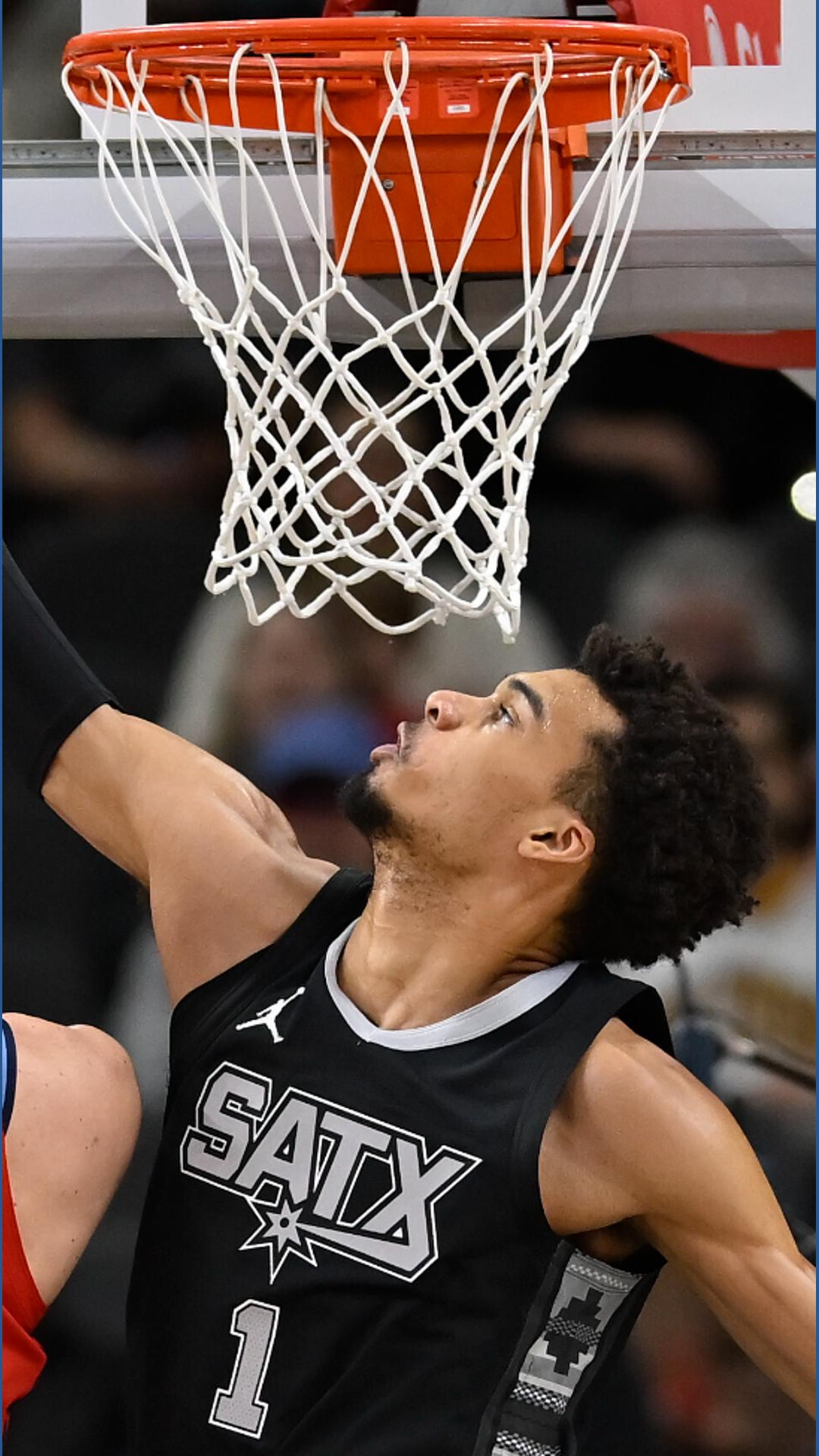Spurs' Wembanyama receives trophy after leading the NBA in blocks ...