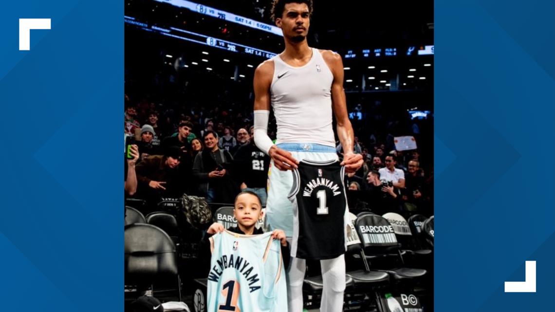 Victor Wembanyama jersey that was swapped with little Spurs fan up for auction. | kens5.com