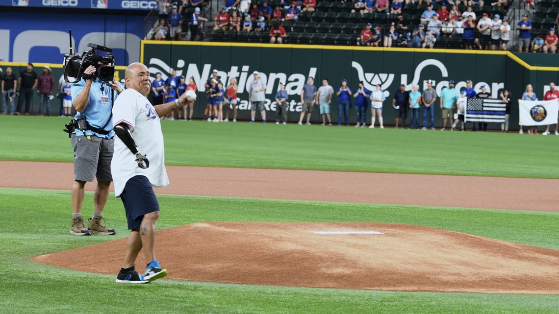 Deputy who lost arm in shooting throws out first pitch at Texas Rangers ...