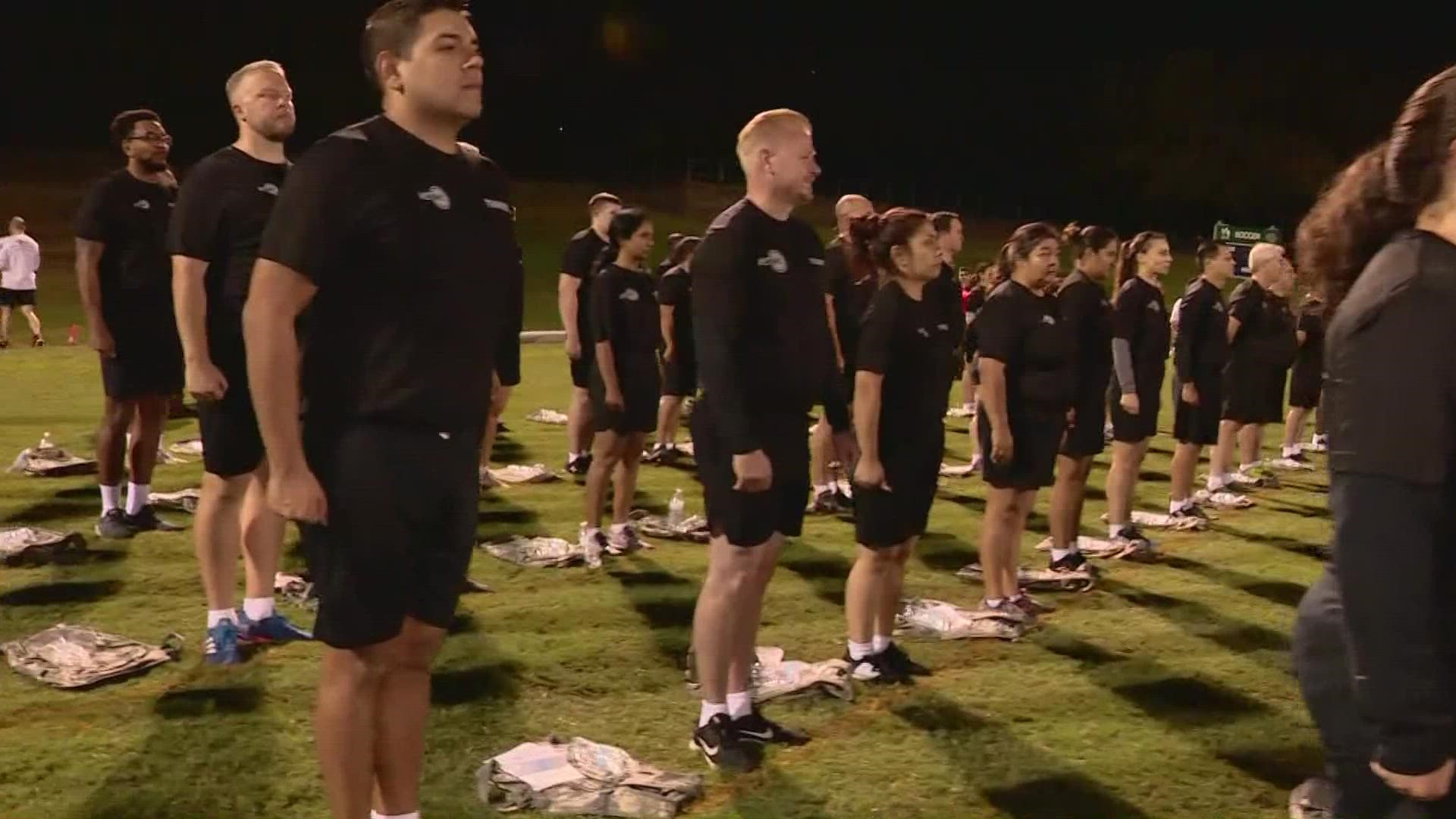 Employees at USAA doing military-style workouts | kens5.com