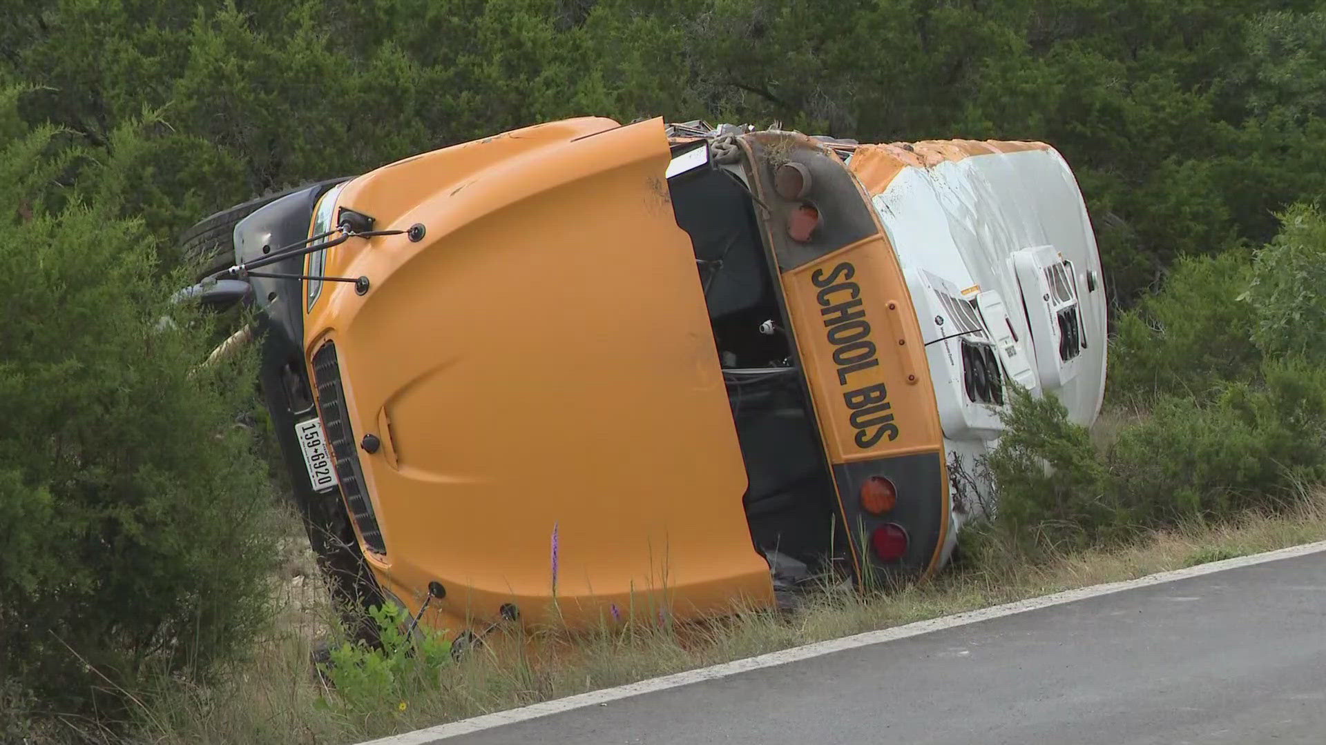 10 hospitalized, 2 in critical condition after school bus rollover ...