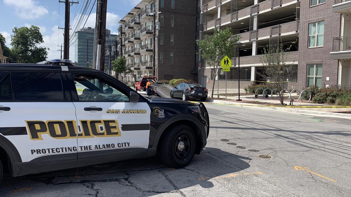 Woman in critical condition after being pinned between two cars | kens5.com