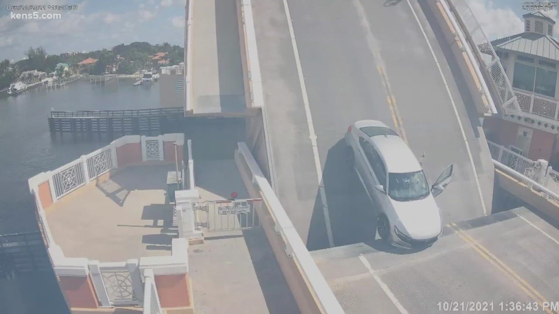 Drunk driver hits police cruiser head-on; drawbridge closes with car on ...
