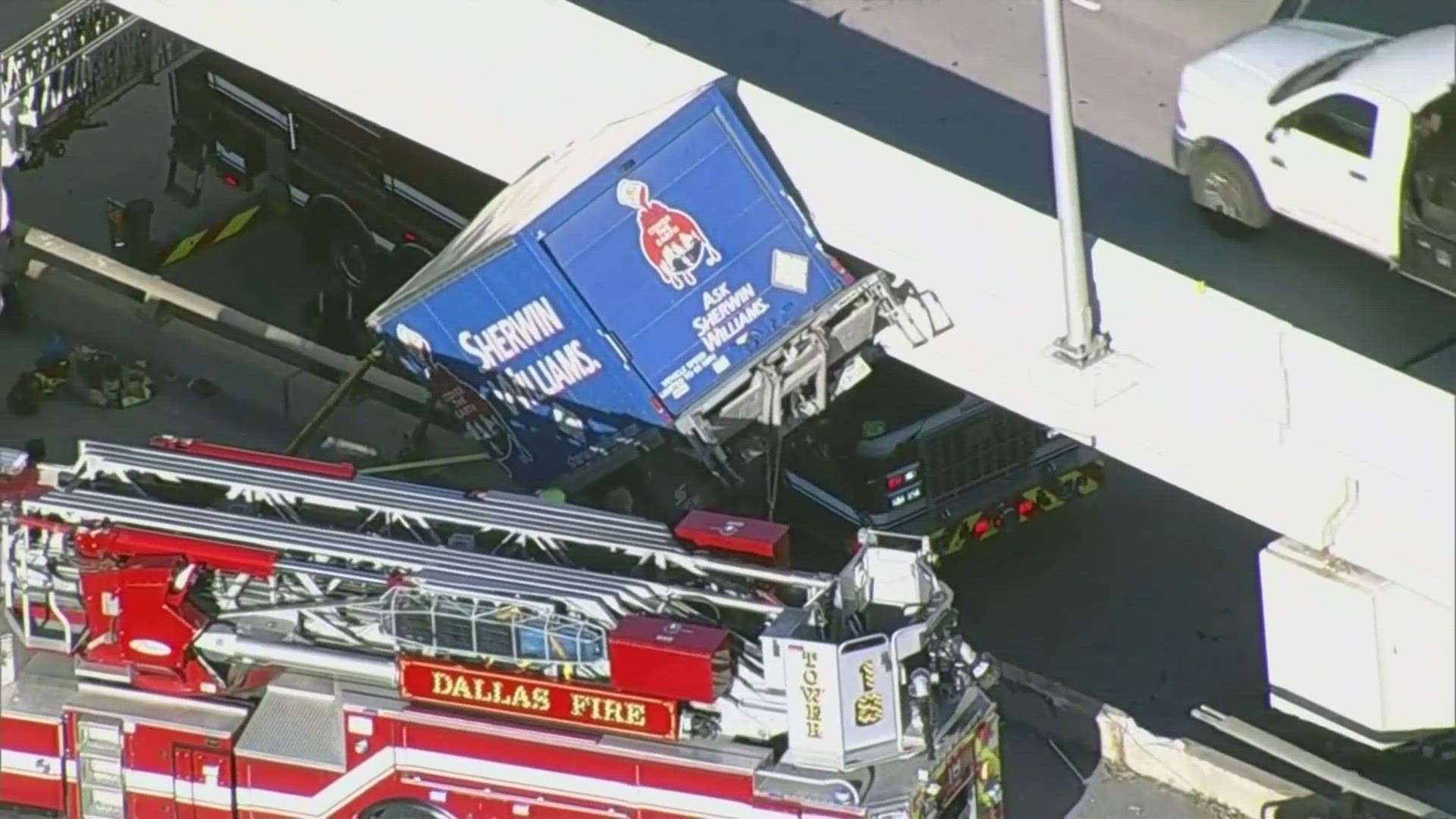 Dramatic helicopter video shows emergency crews rescue driver from ...