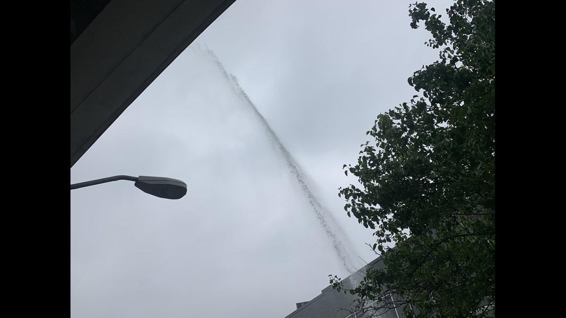 Water main break causes water to shoot 30 feet in the air outside ...