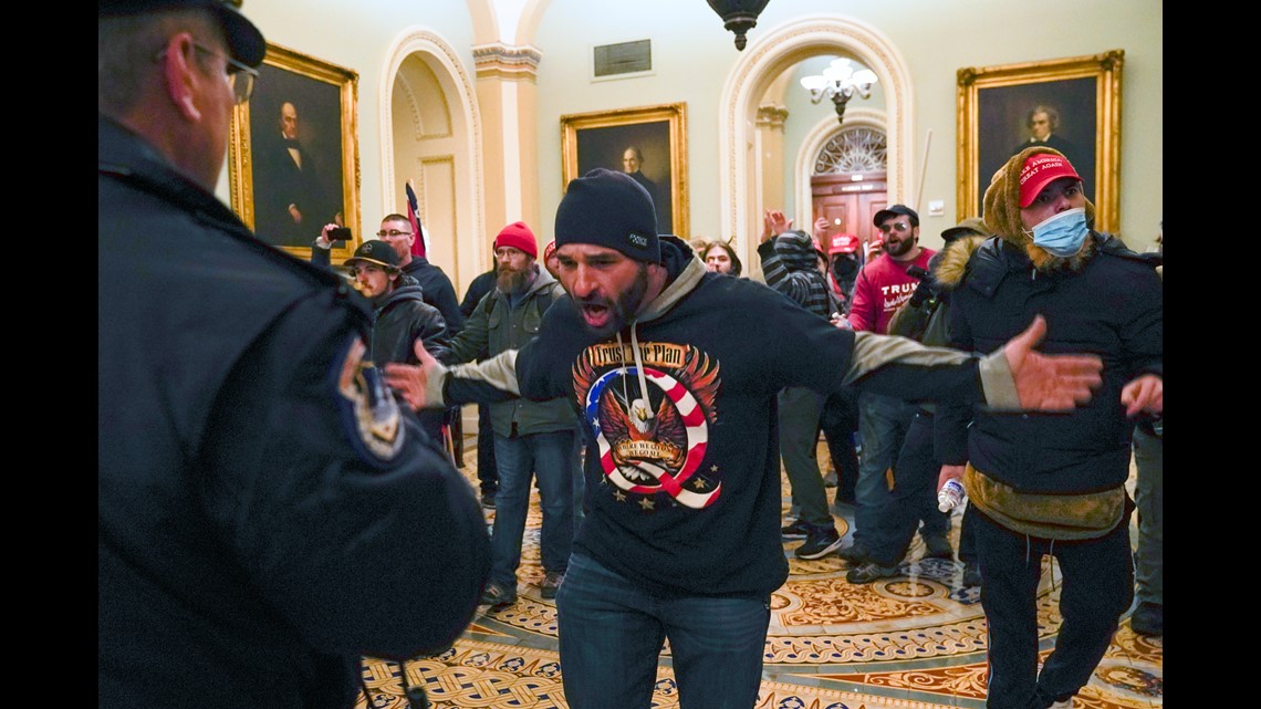 Ex-HPD officer Tam Dinh Pham faces two federal charges for riot | kens5.com